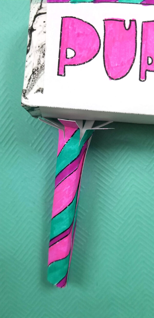 Purim Grogger Craft - Make your own paper noisemaker!