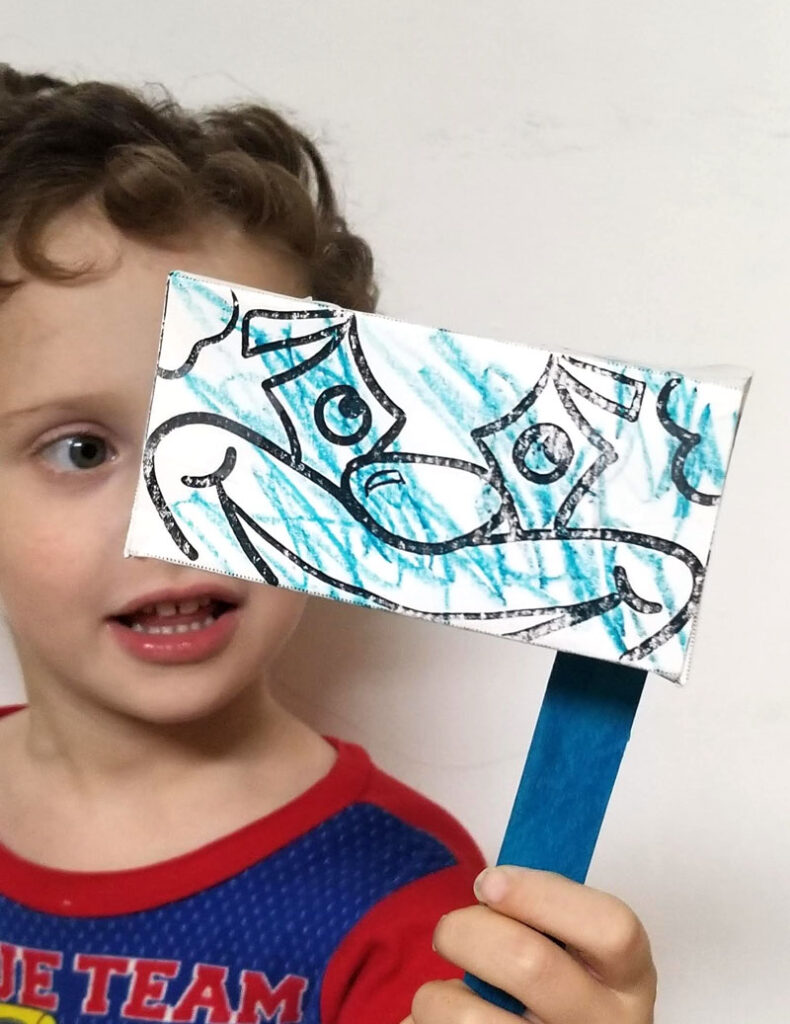 Purim Grogger Craft - Make your own paper noisemaker!