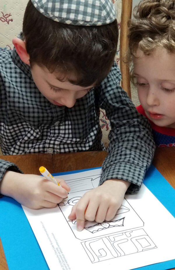 Purim Grogger Craft - Make your own paper noisemaker!