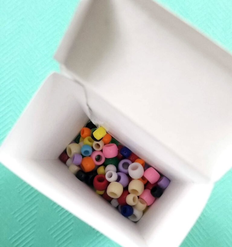 Purim Grogger Craft - Make your own paper noisemaker!