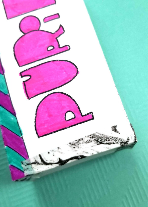 Purim Grogger Craft - Make your own paper noisemaker!