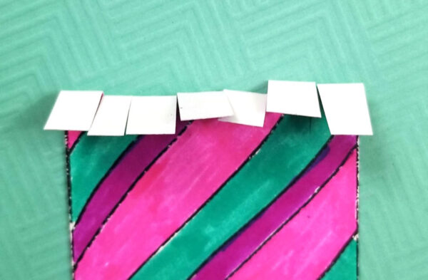 Purim Grogger Craft - Make your own paper noisemaker!