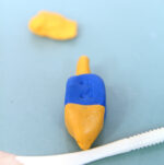 How to Make a Dreidel Out of Clay - Jewish Moms & Crafters